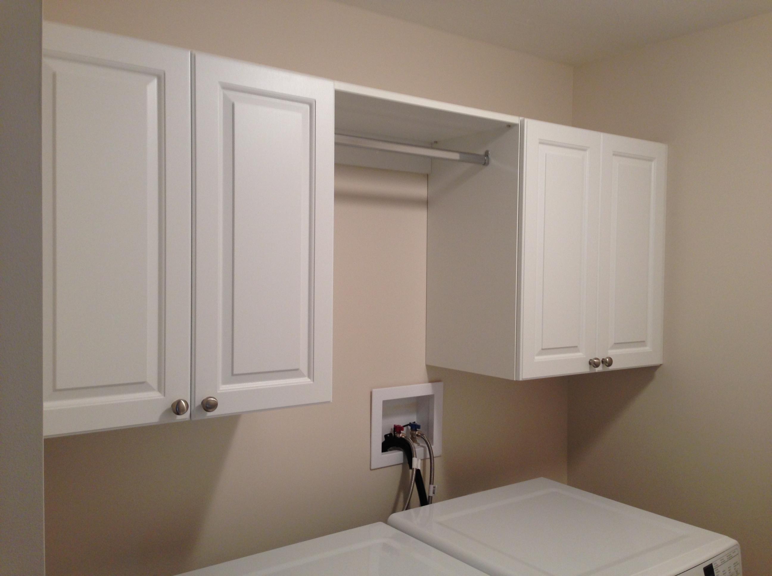 hanging in laundry area – Creative Closet Solutions